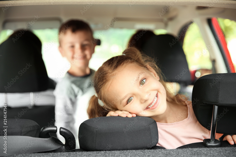 Cute children in car. Happy family taking road trip Stock Photo | Adobe ...