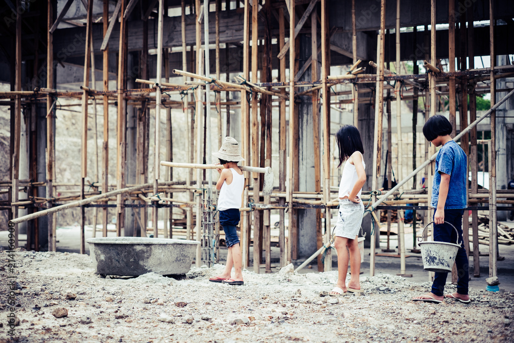 Little girl labor working in commercial building structure, World Day ...