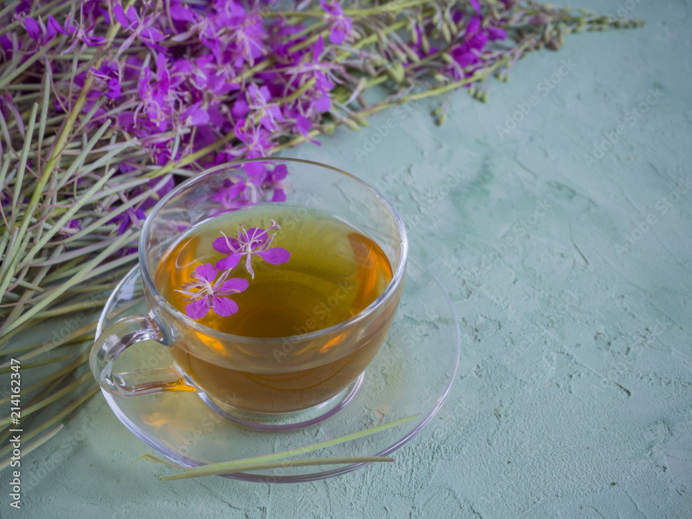 Traditional Russian herbal drink Ivan-tea in a transparent cup ...