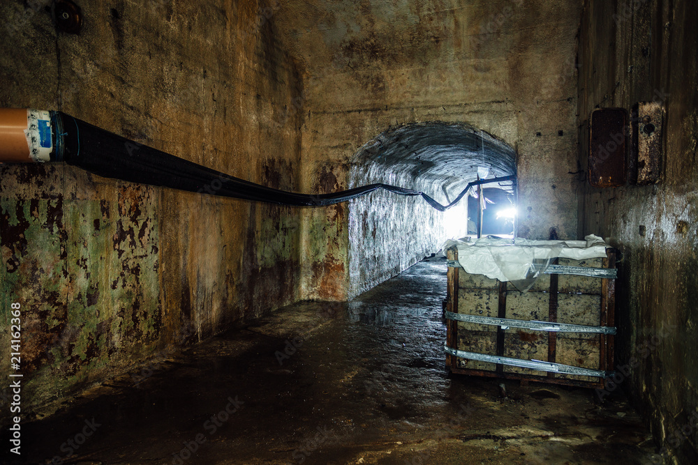 Dark and creepy corridor of old abandoned forgotten Soviet underground ...