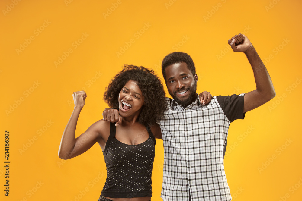 Winning success couple celebrating being a winner. Dynamic energetic ...