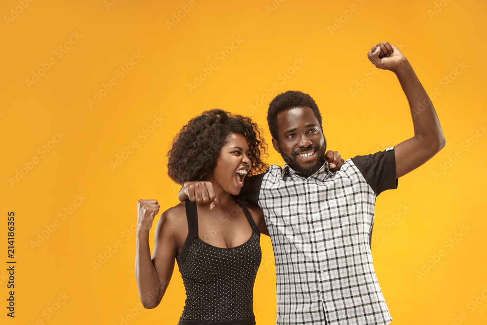 Winning success couple celebrating being a winner. Dynamic energetic ...