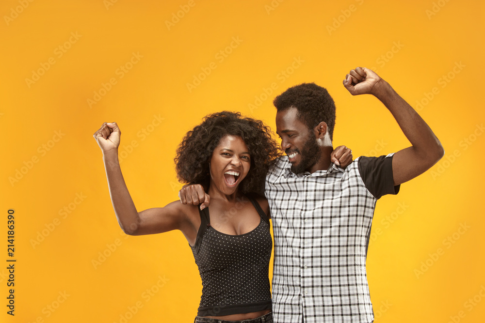 Winning success couple celebrating being a winner. Dynamic energetic ...