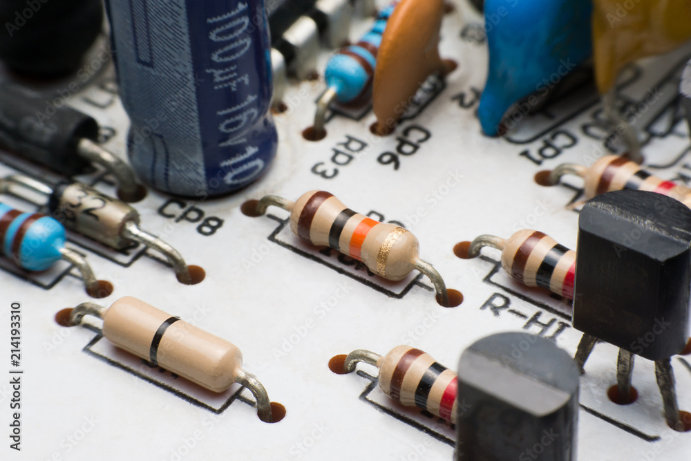 Resistor, Capacitor and Transistor on Circuit Board close up ...