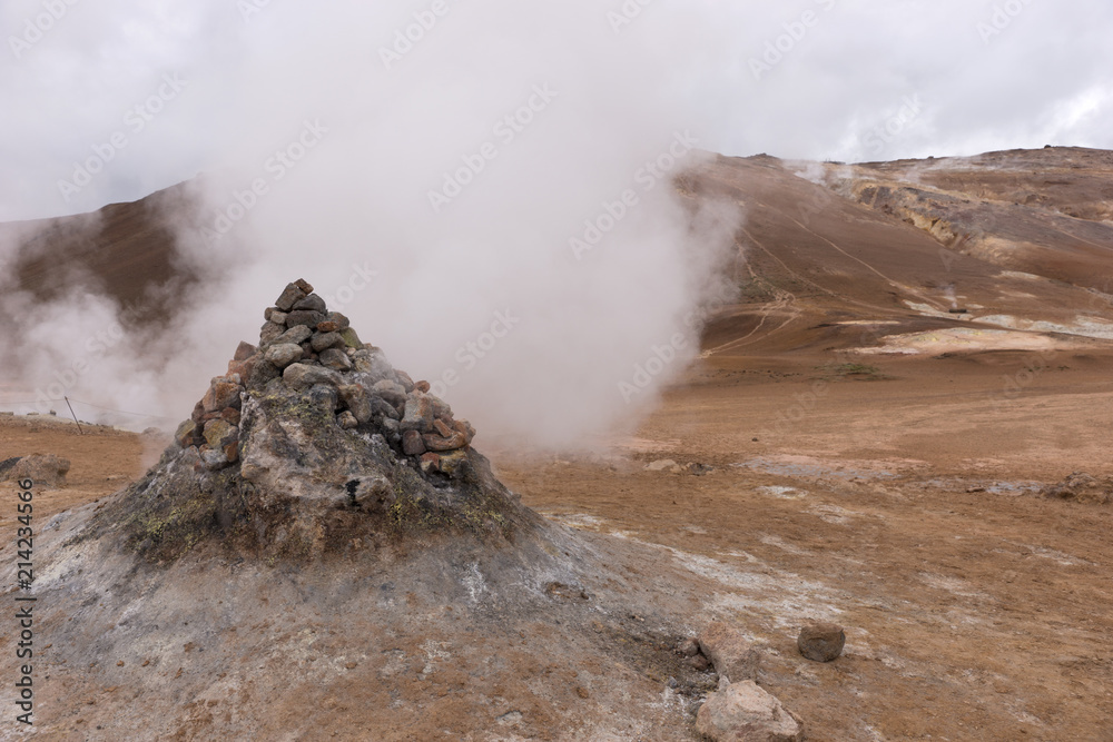 Steaming sulphur fumaroles at geothermal area Hverir in north Iceland ...
