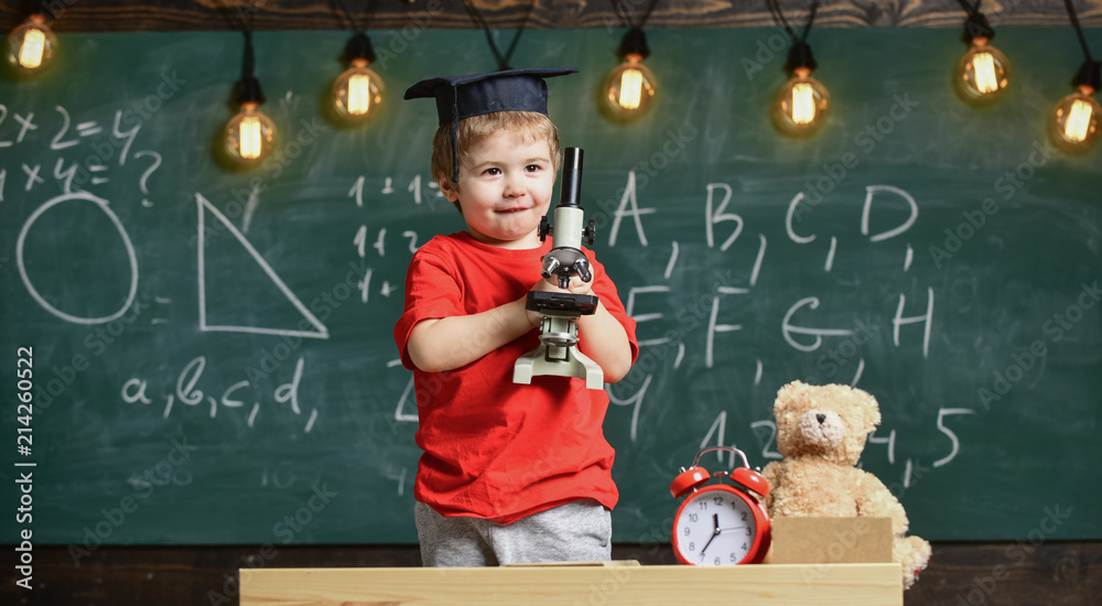 Smart kid concept. First former interested in studying, learning ...