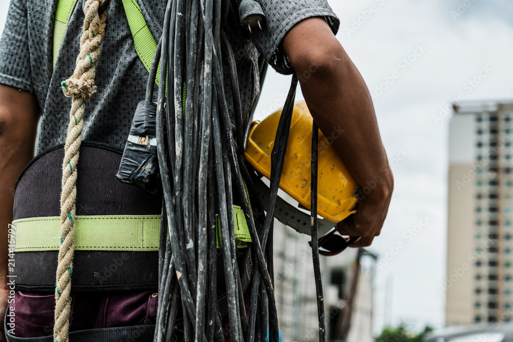 contractor workmen with helmet and belt tool with background of ...