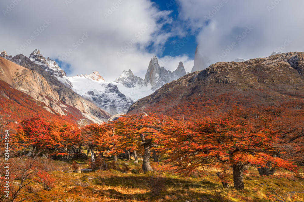 Fitzroy landscape with autumn trees, cloudy sky and the snow on the ...