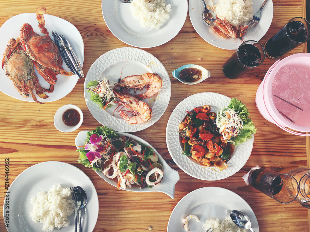 Family or friends in summer party or seafood set dinner. Flat-lay of ...
