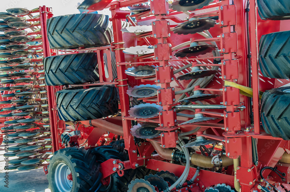 modern tractor for agriculture on the farm with a powerful motor, the ...