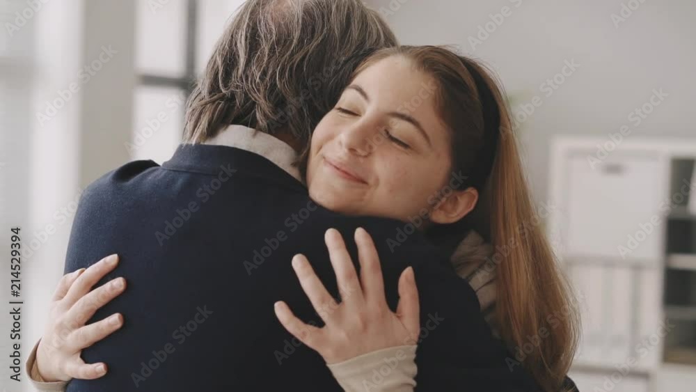 Girl hugging her father with love Stock Video | Adobe Stock