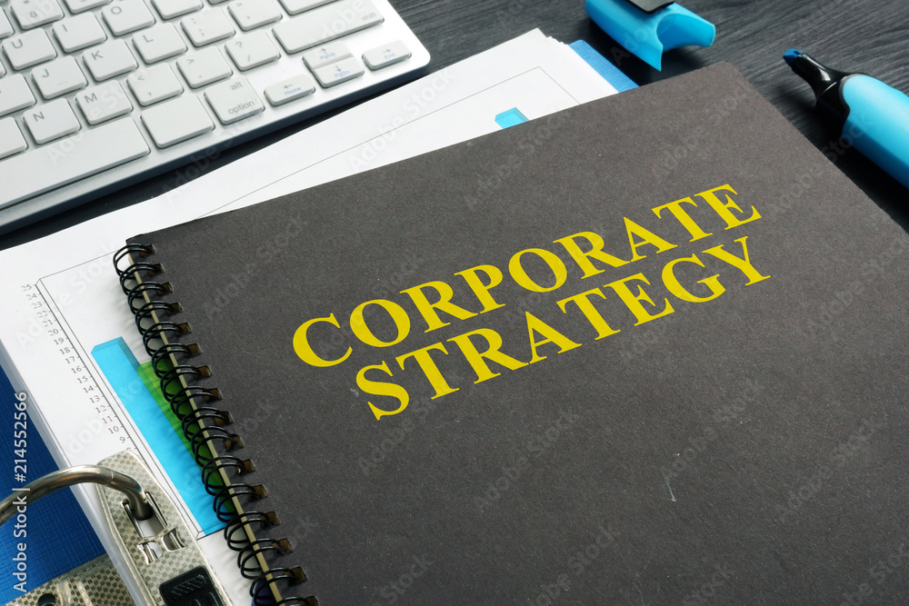 Corporate strategy plan and documents on a desk. Stock Photo | Adobe Stock