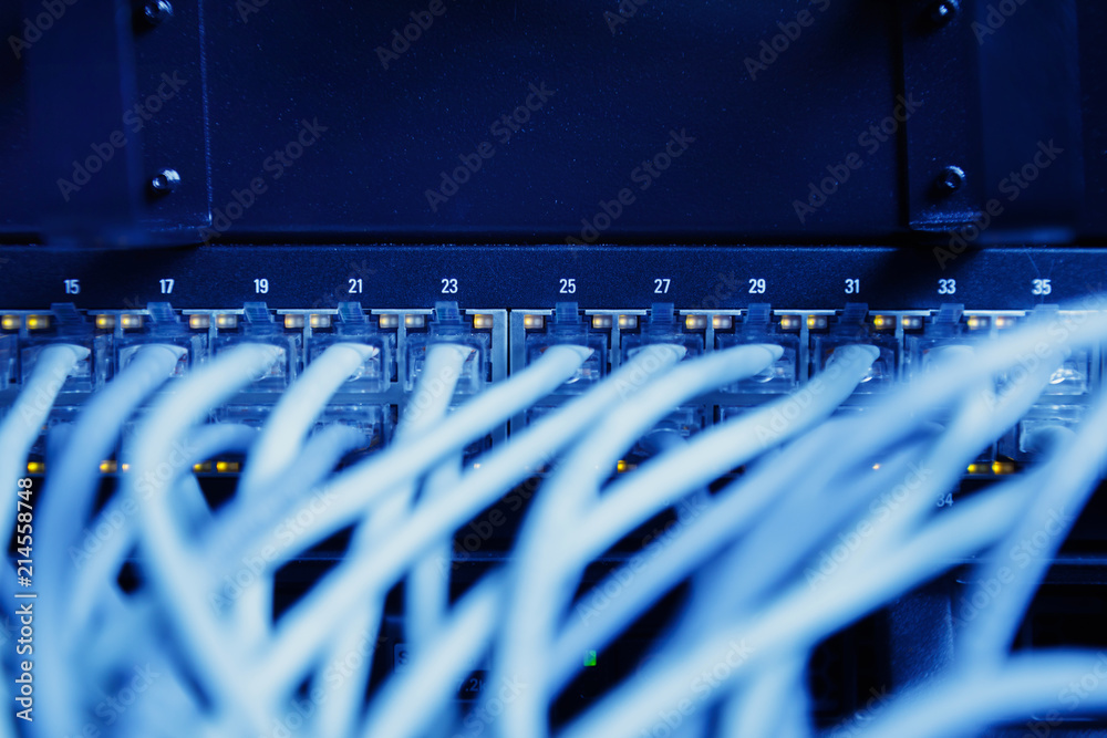 Network panel, switch and cable in data center Stock Photo | Adobe Stock