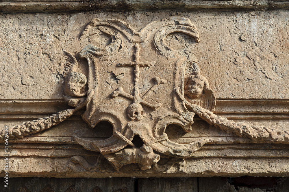 old coat of arms of the Spanish Inquisition in the town of Villanueva ...