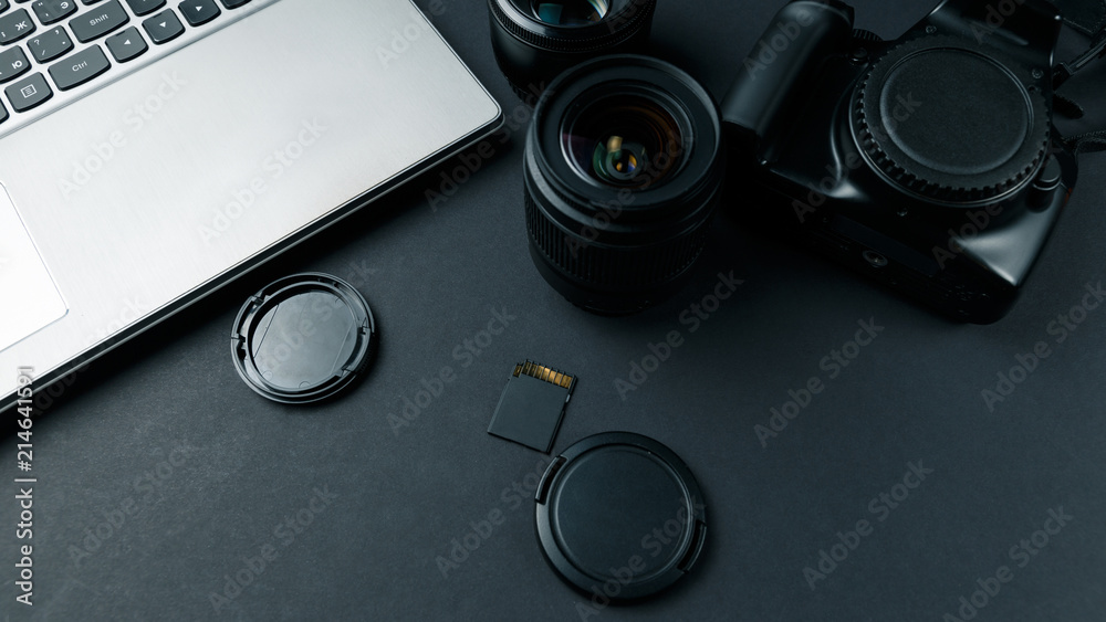 Work space on black table of photographer. Minimal workspace with ...