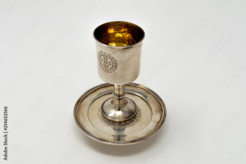 A stirling silver communion chalice to hold the wine during Holy ...