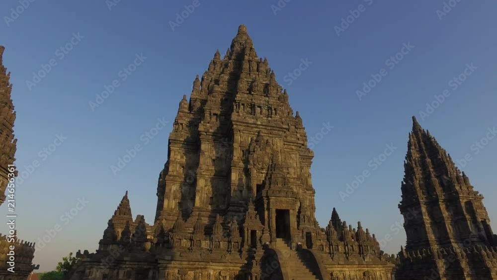 Forward dolly shot of Candi Brahma, Wisnu, and Siwa as three main ...