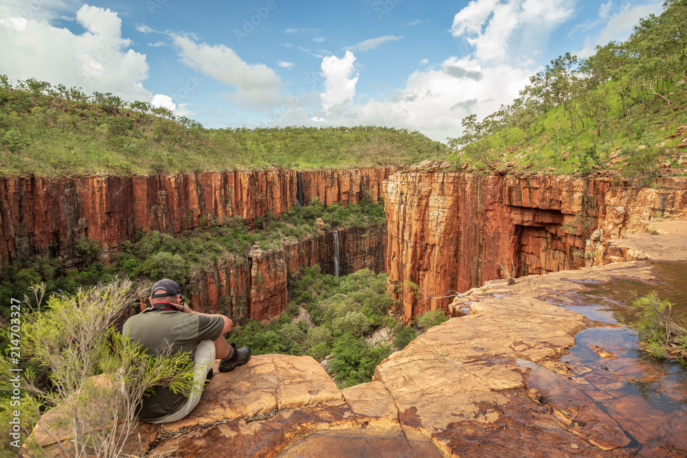 Landscape photographer photographing the iconic cliffs and high plateau ...