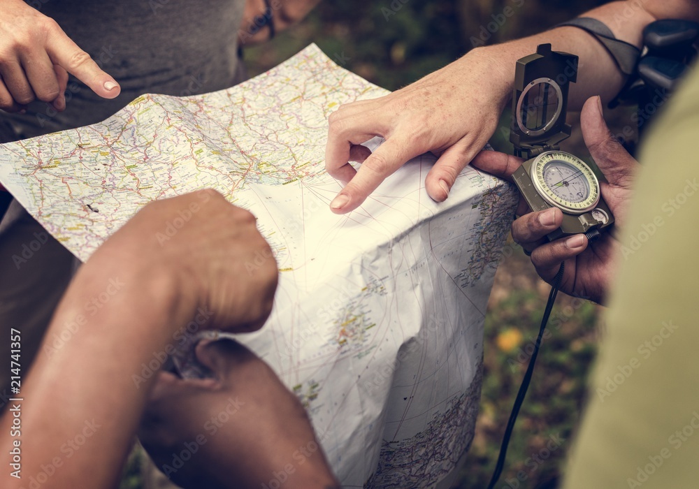 Checking on the map for directions Stock Photo | Adobe Stock