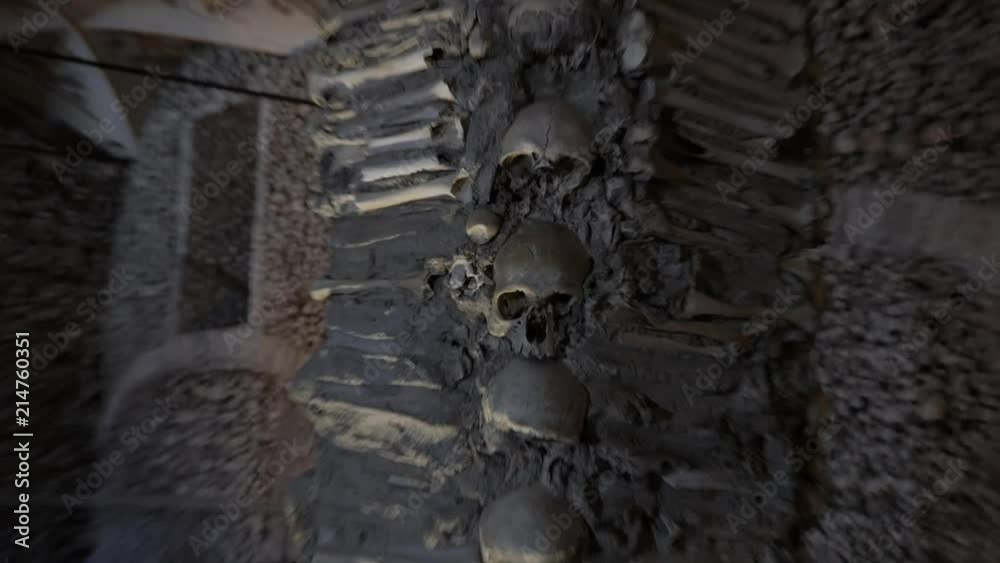 Wall of Human Bones And Skulls Zoom In. Ancient walls of a chapel ...