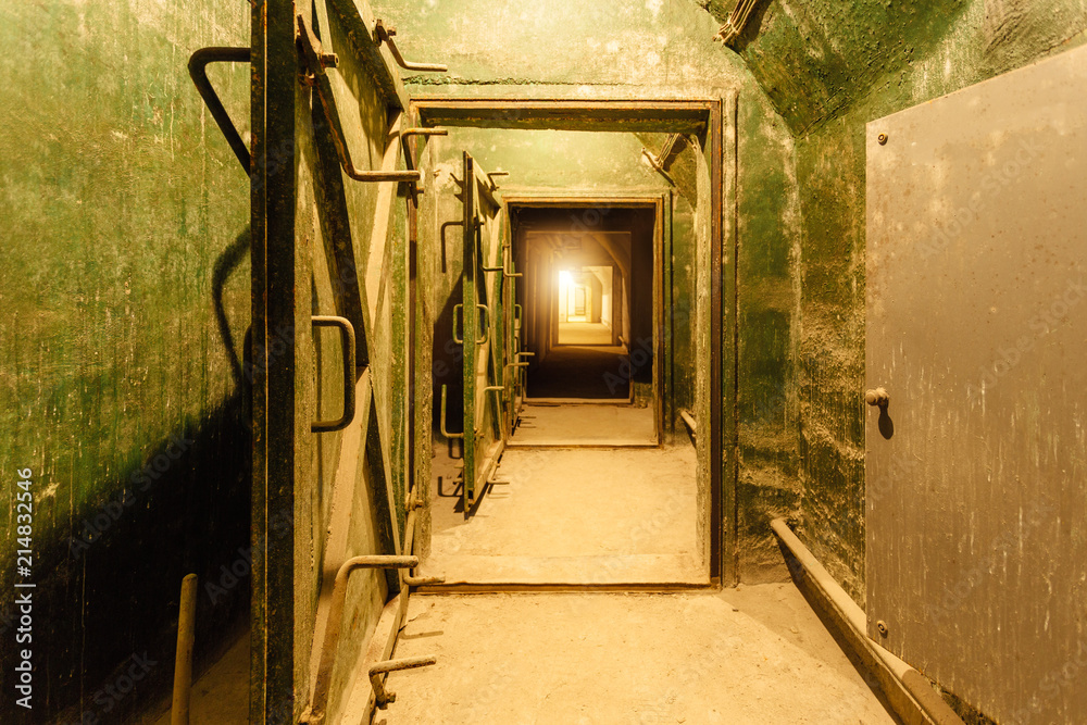 Dark corridor of old underground Soviet military bunker under ...