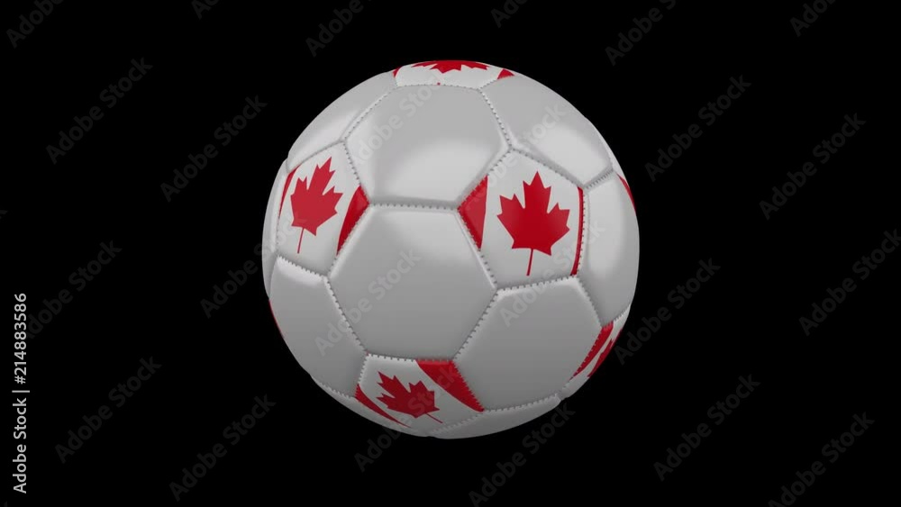 Soccer ball with the flag of Canada colors rotates on transparent ...