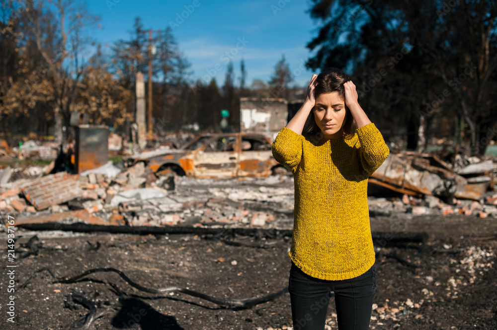 Sad Woman Home Owner Holds His Head By Hand Checking Burnt Out House