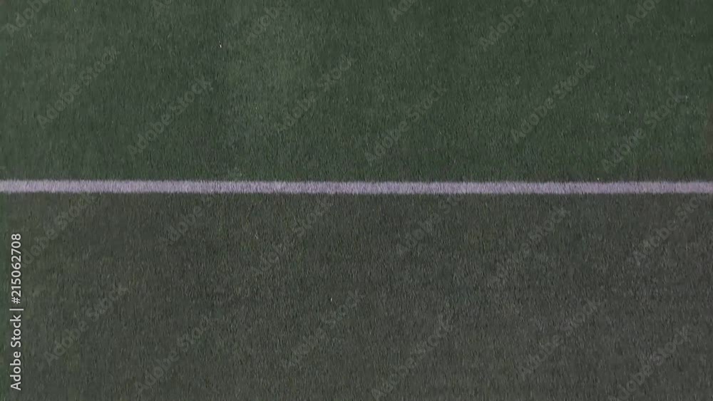 Flyover veiw of football field yardlines Stock Video | Adobe Stock