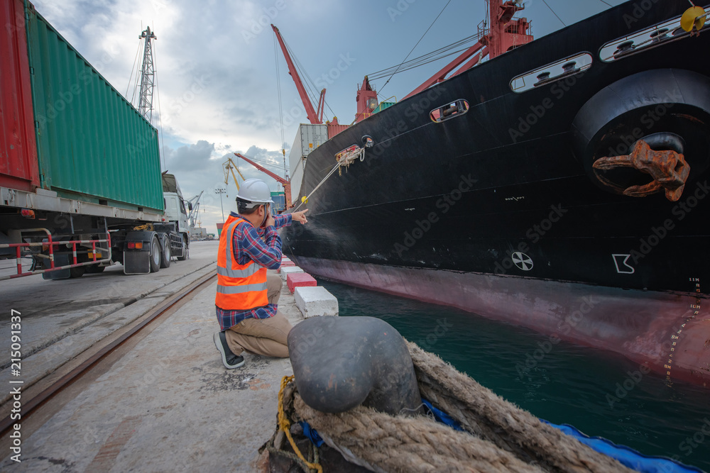 Stevedore forman, supervisor, harbour master, port captain working in ...