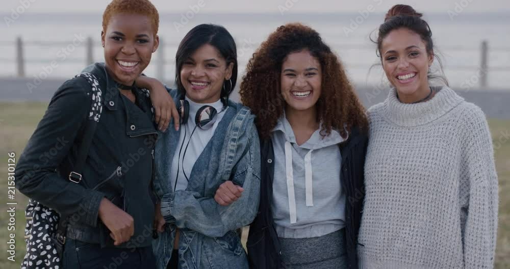 portrait diverse group of women laughing enjoying happy reunion ...