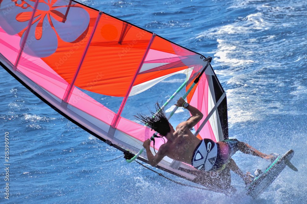 extreme windsurfing, the moment of the surfer's falling of the speeding ...