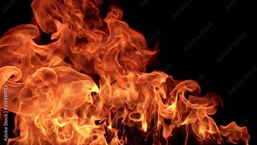 Fire flame isolated on black background. Slow motion / red, yellow ...