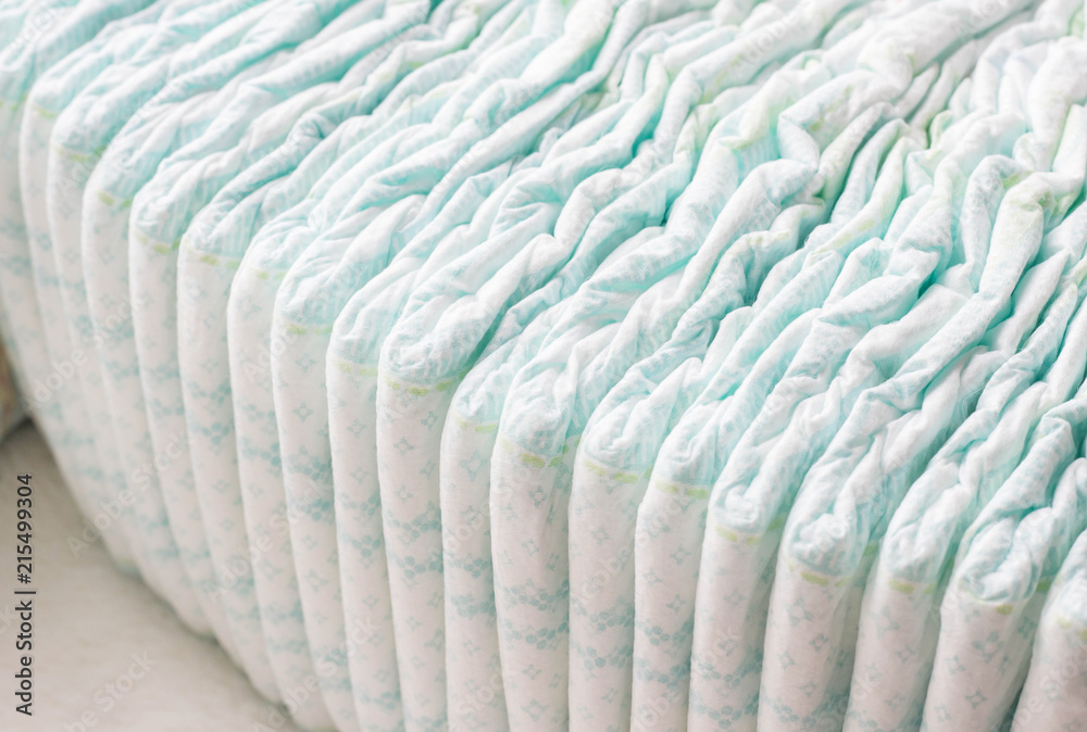 A large stack of baby diapers, close-ups, diaper packaging Stock 写真 ...