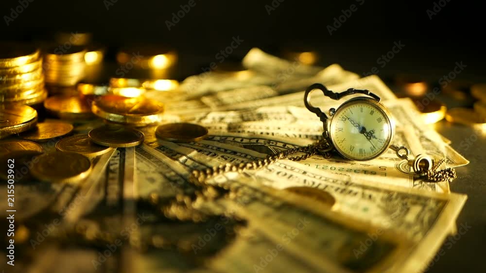 Management efficiency. Stacks of golden coins dollar notes on black ...