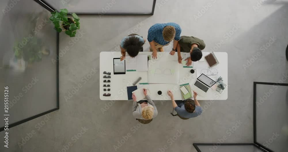 young creative design team designing sunglasses brainstorming ideas ...