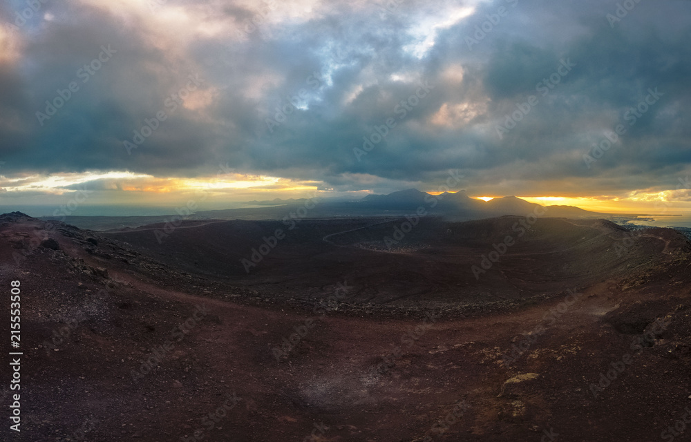 Red Mountain is a small volcano located on top of the white beach ...