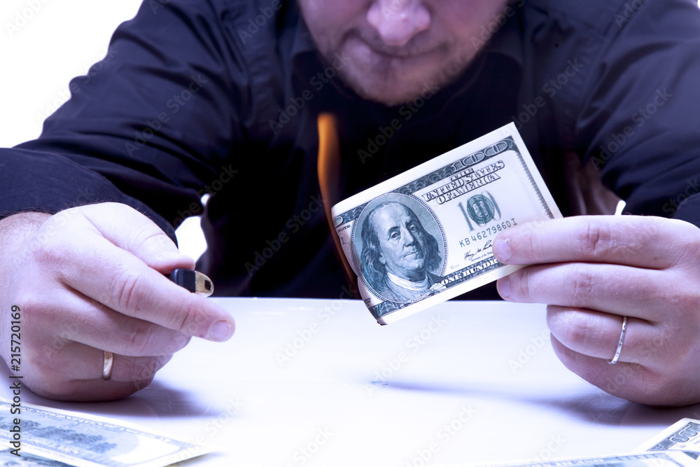 Money is not the best method of employee motivation. Man burns a ...