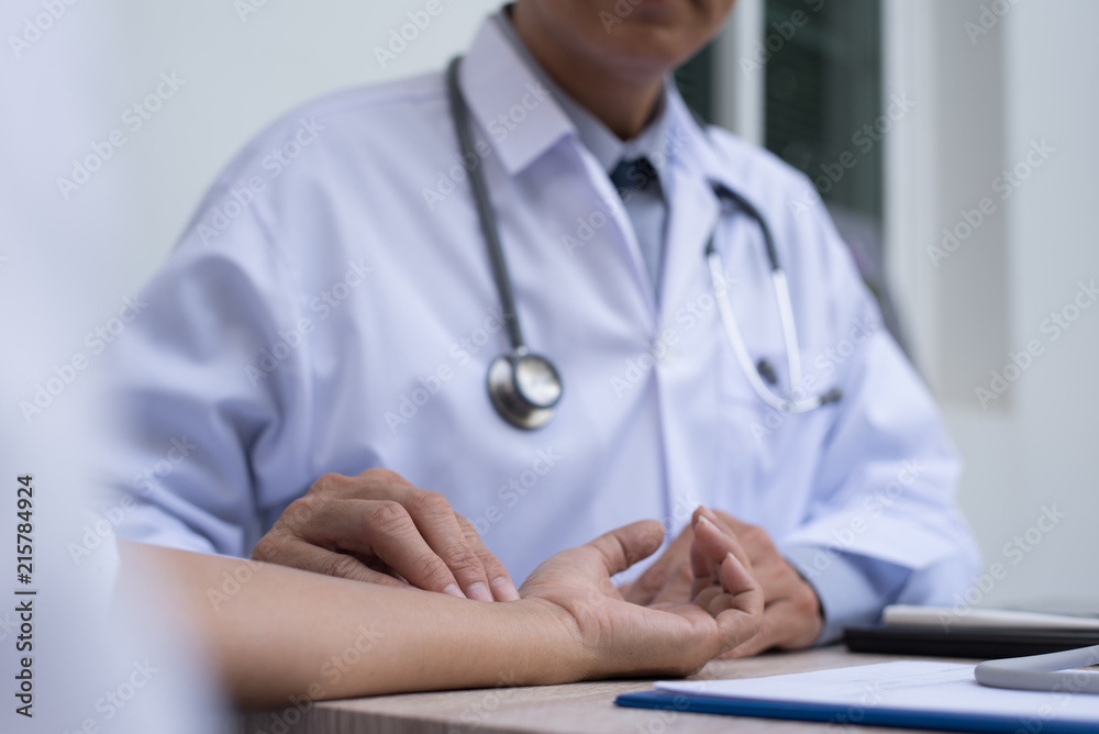 Doctor explaining to patient Stock Photo | Adobe Stock