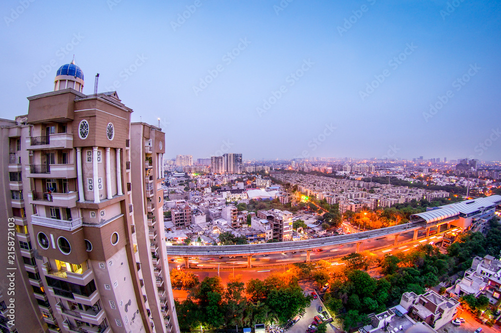 Noida gurgaon cityscape at blue hour with skyscrpaers, buildings, homes ...