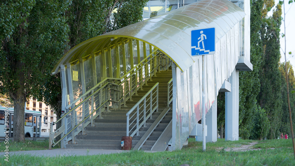 the pedestrian overpass is equipped with a modern ramp for disabled ...