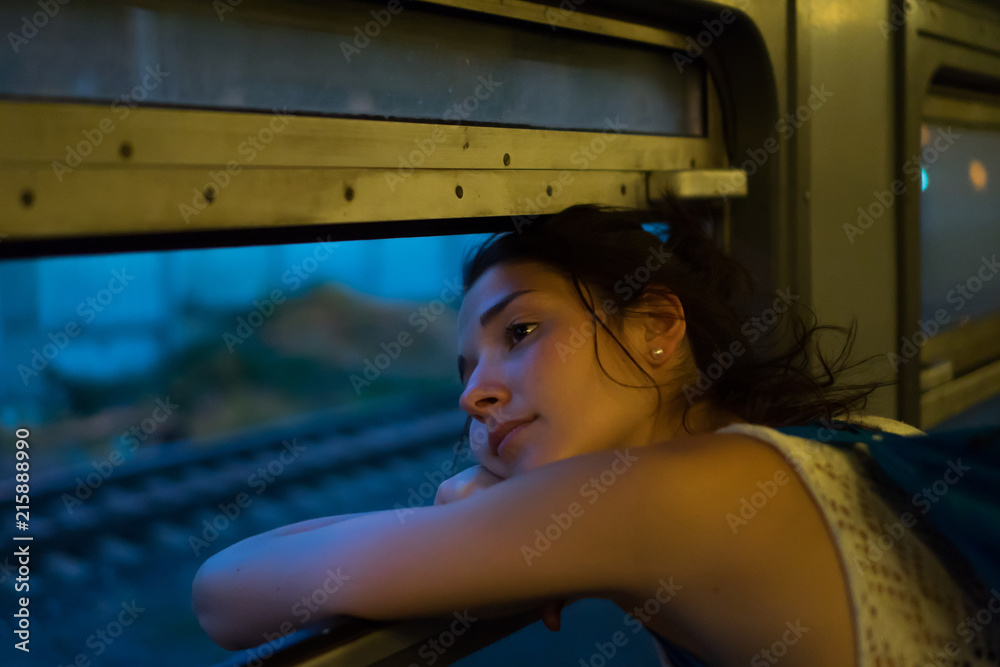 Girl on a train. Stock Photo | Adobe Stock