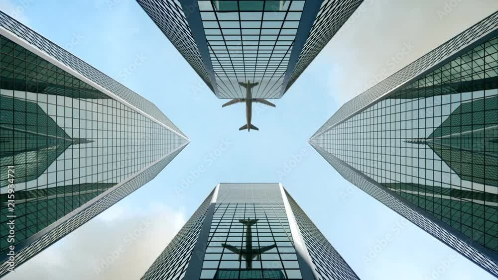 Airplane flying over skyscrapers and reflects in glass modern facades ...