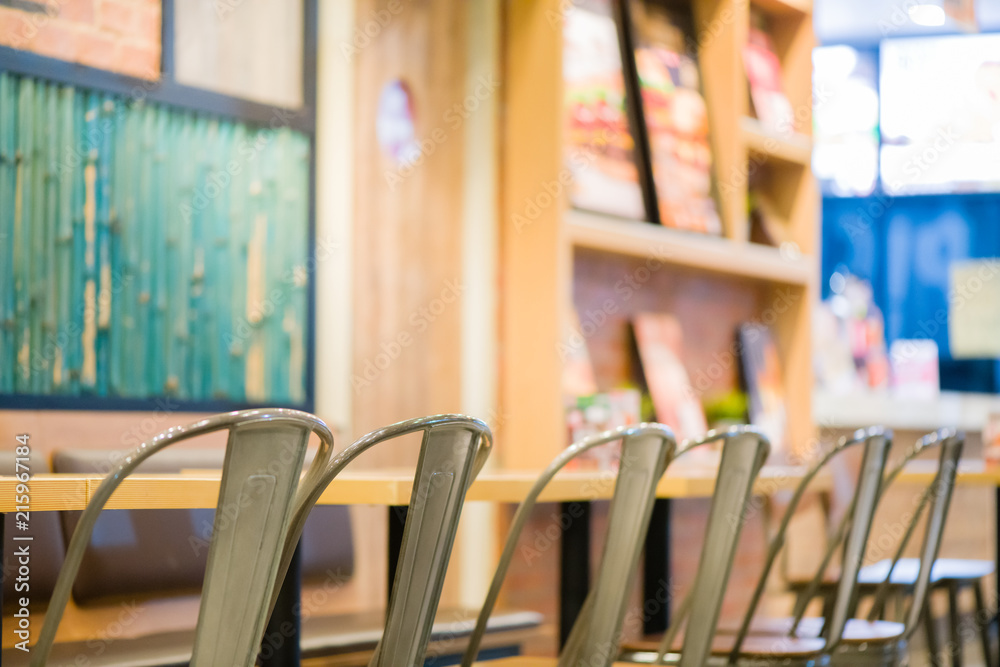 many seat steel chair and wooden table in fast food.beautiful interior ...