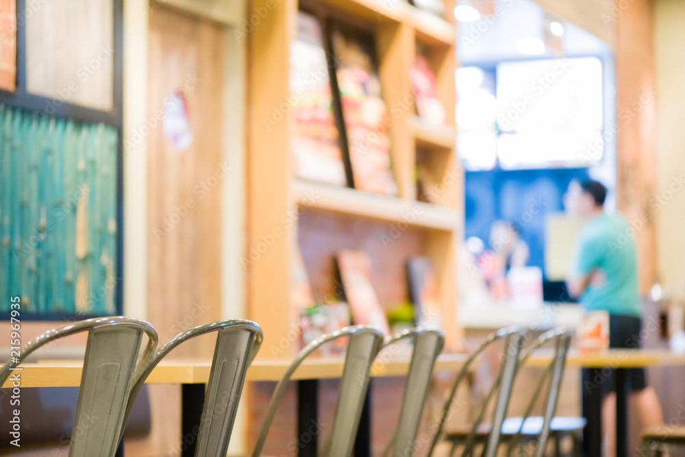 many seat steel chair and wooden table in fast food.beautiful interior ...