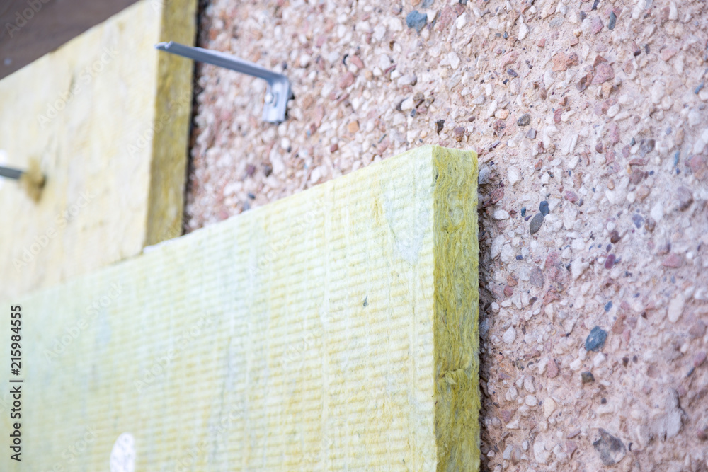 Warming of the apartment house. External repair work on the building ...