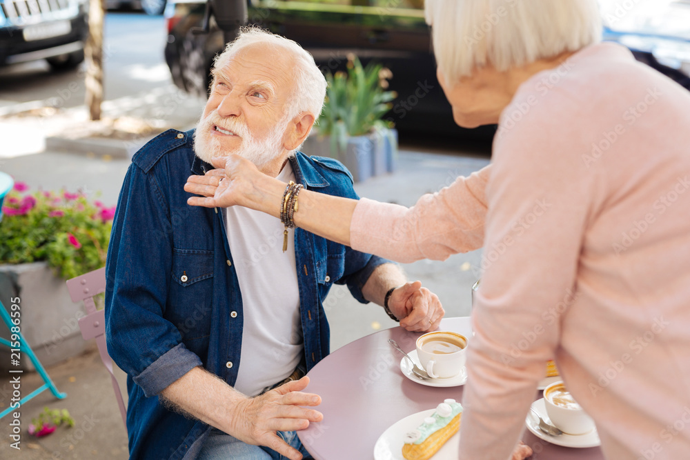 How dare you. Painful senior man receiving slap while woman leaning on ...