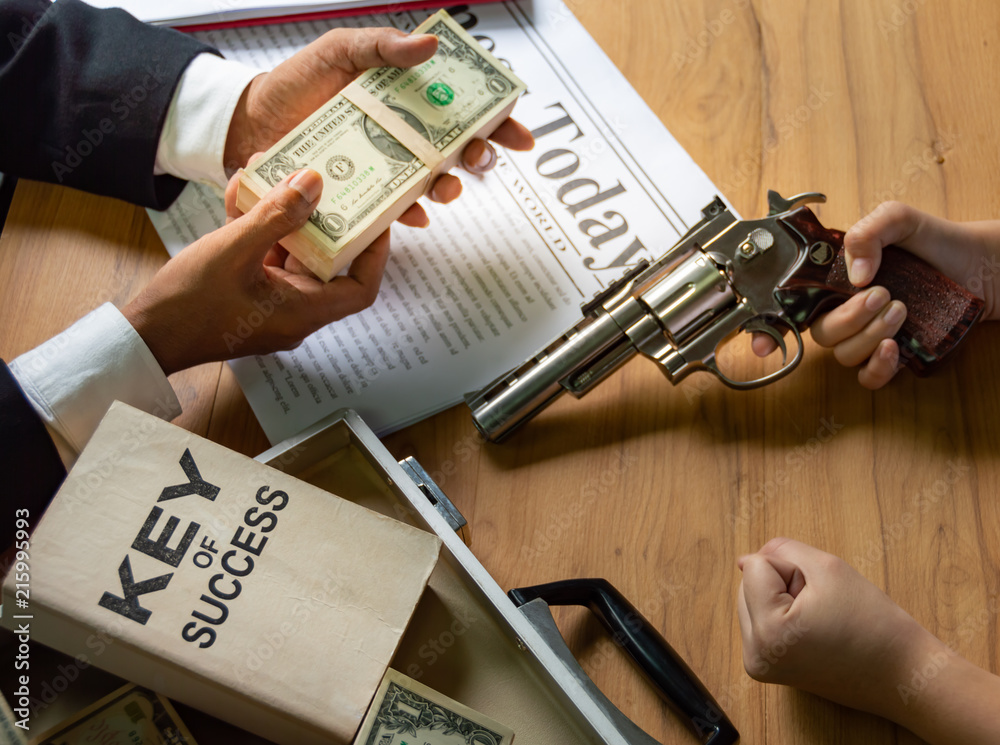 Money On Table With Gun