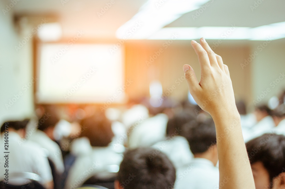 businessman raising hand during seminar. Businessman Raising Hand Up at ...