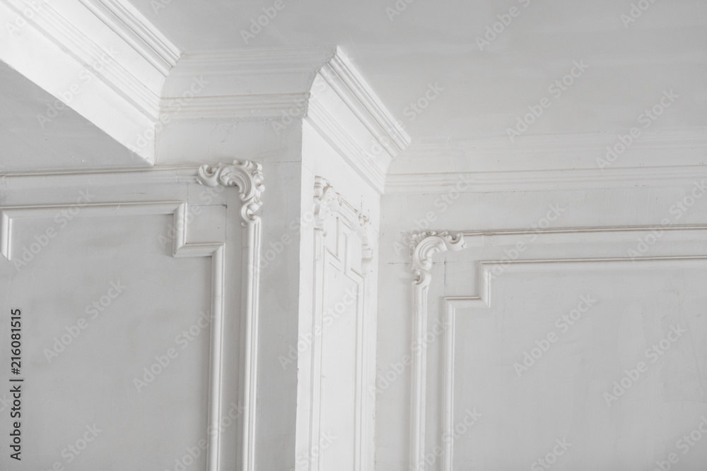 unfinished plaster molding on the ceiling and columns. decorative ...