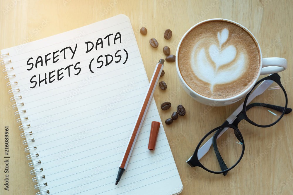 Foto de Concept SAFETY DATA SHEETS (SDS) message on notebook with ...